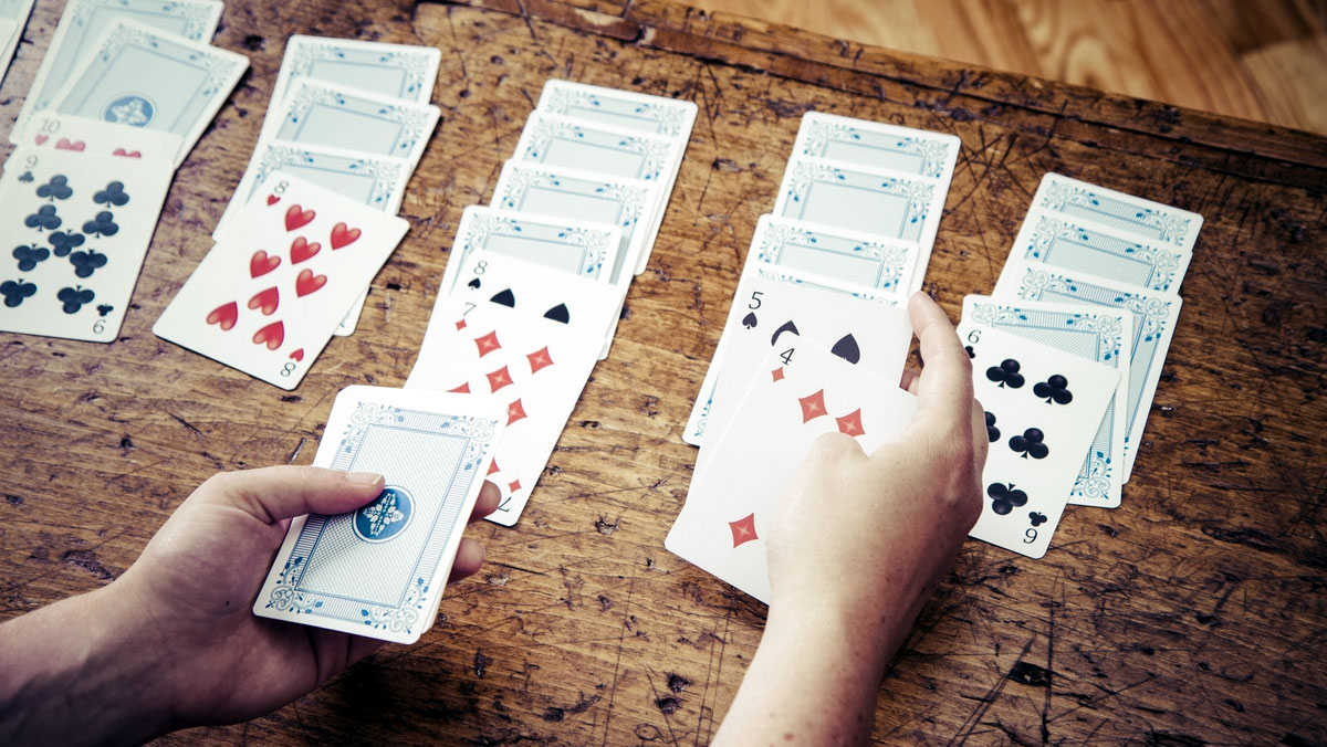 The Origin of Patience Games in English — The World of Playing Cards